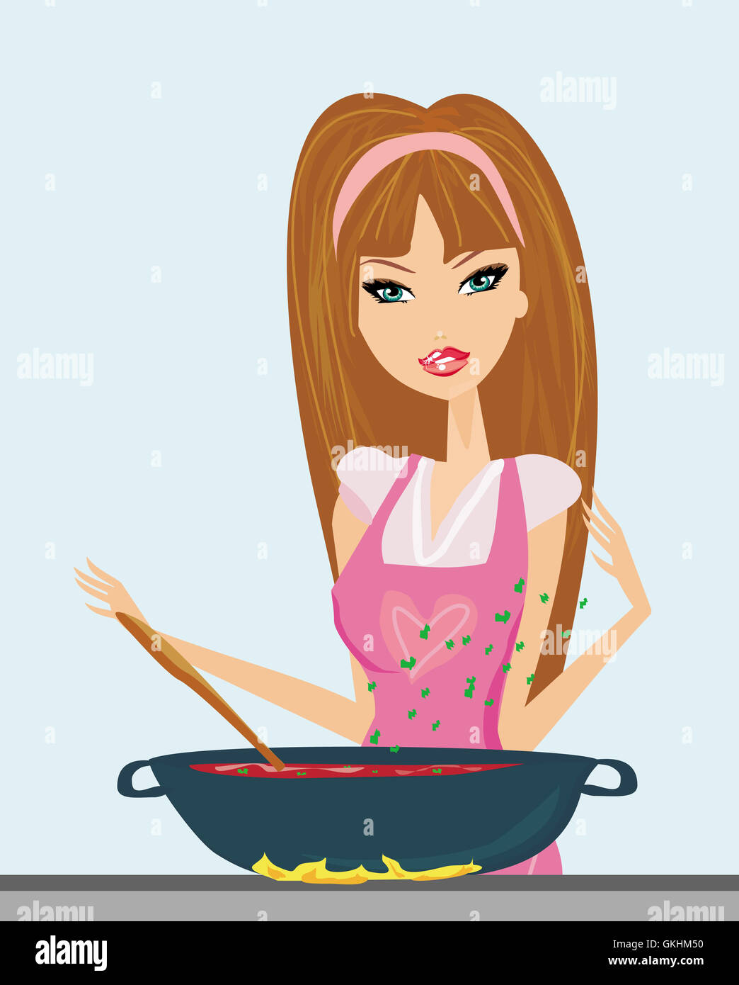 Beautiful lady cooking Stock Photo - Alamy