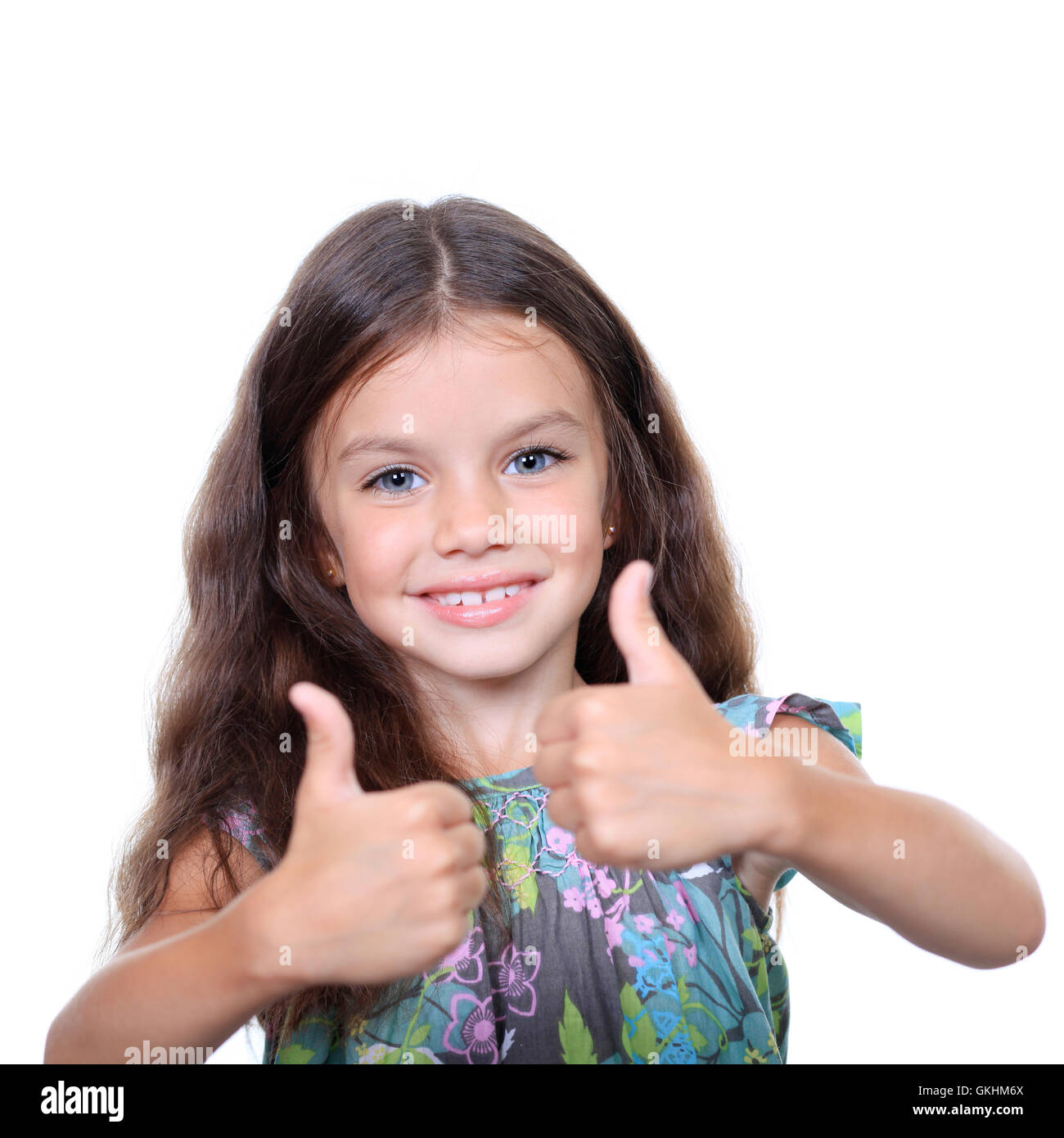 Beautiful little girl shows finger as sign that everything is fine ...
