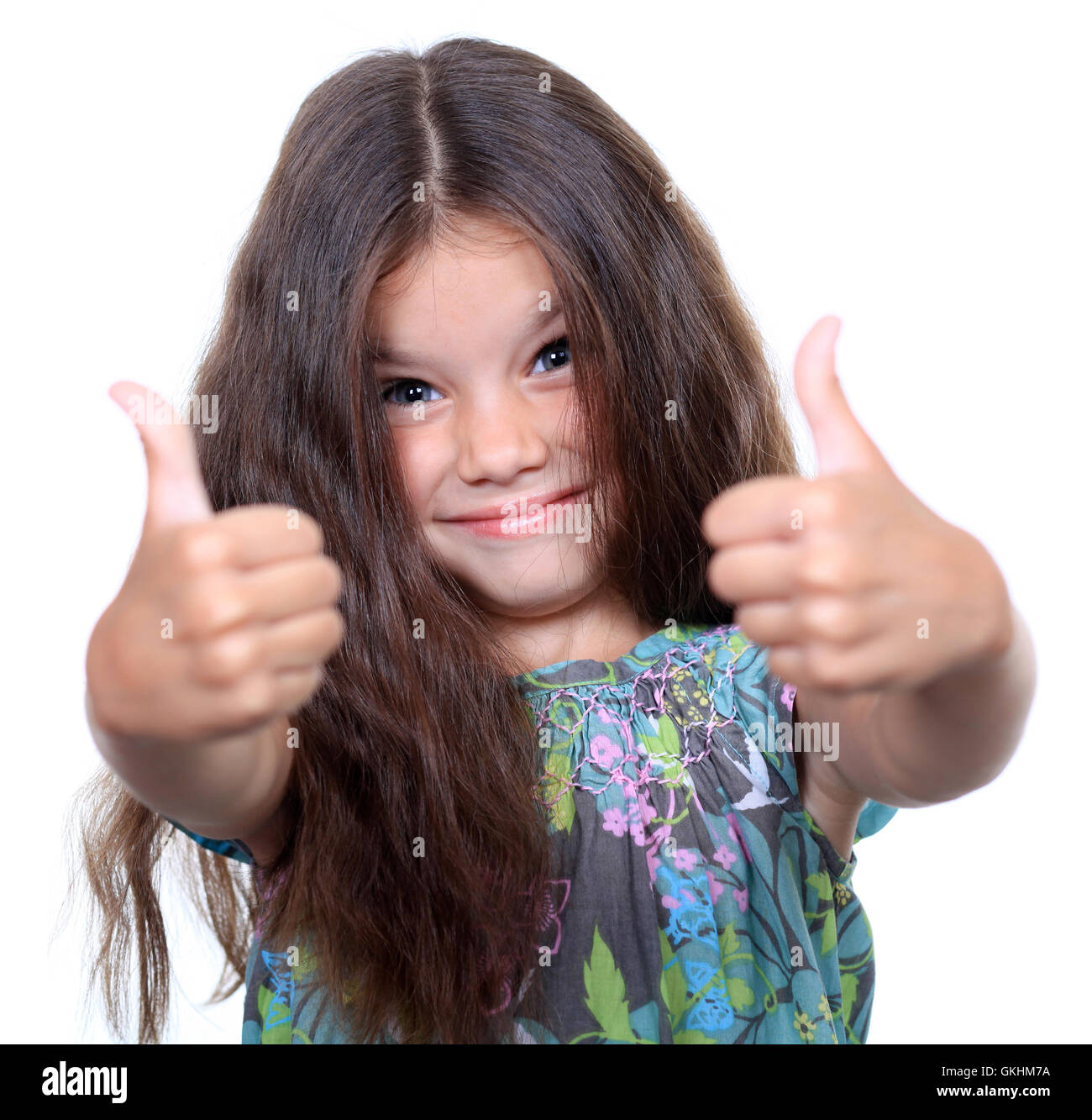 Beautiful little girl shows finger as sign that everything is fine ...