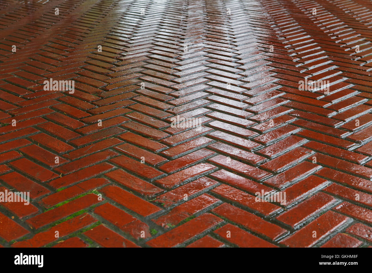 Wet red Brick Road Stock Photo - Alamy