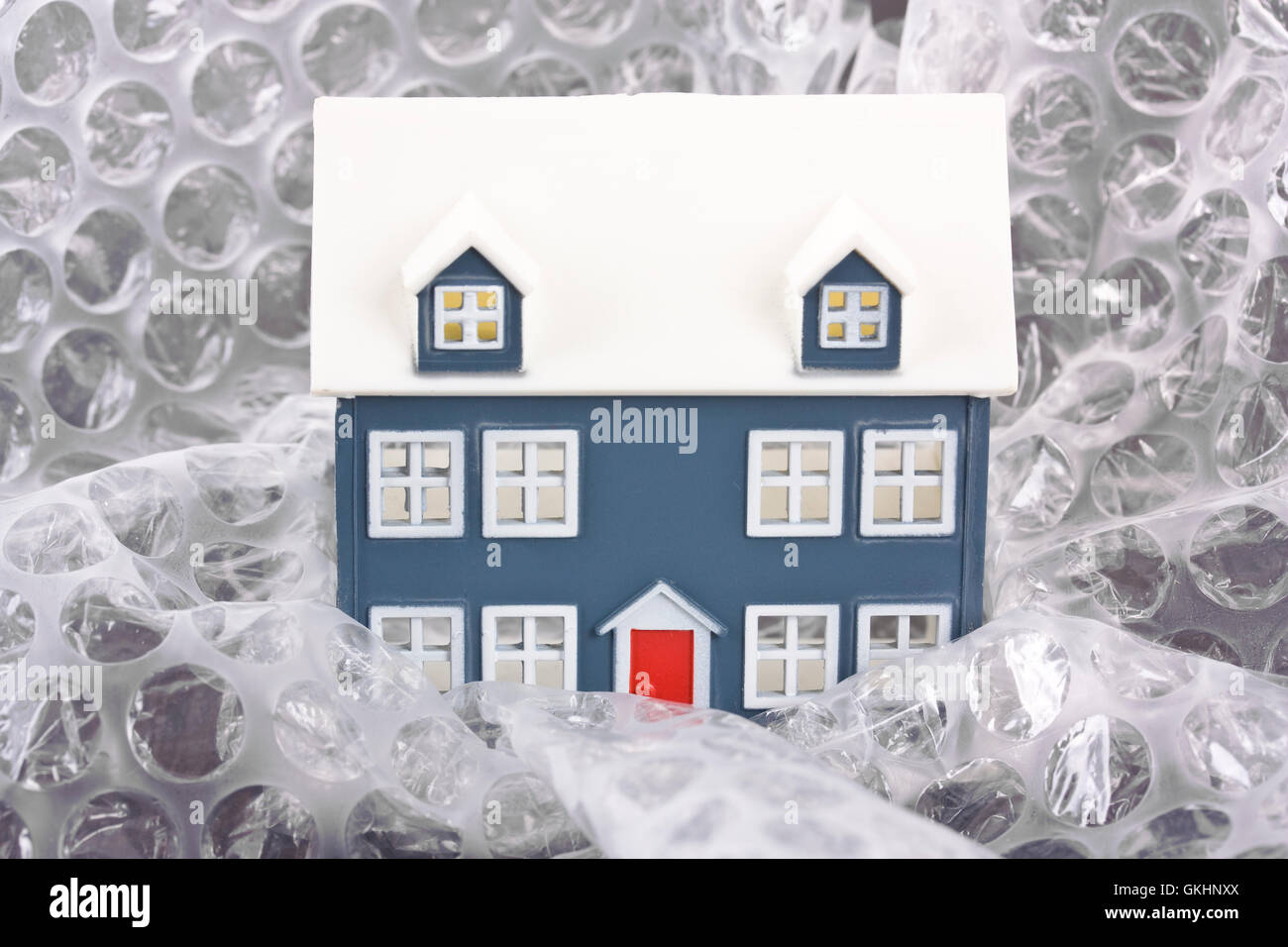 House protected with bubble wrap Stock Photo - Alamy