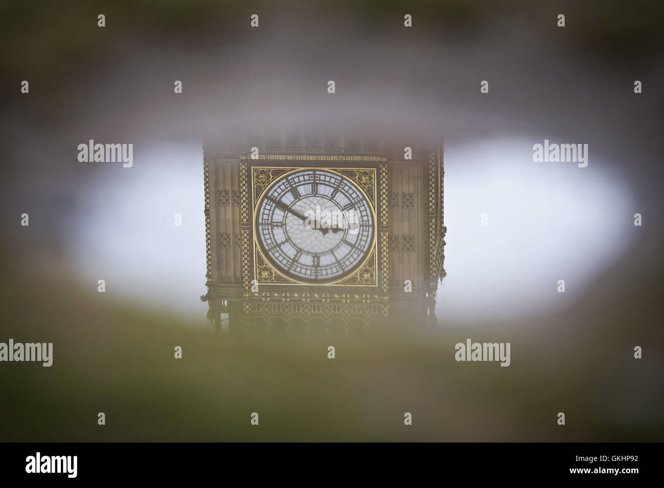UK, London : Big Ben at the Houses of Parliament is reflected in a ...