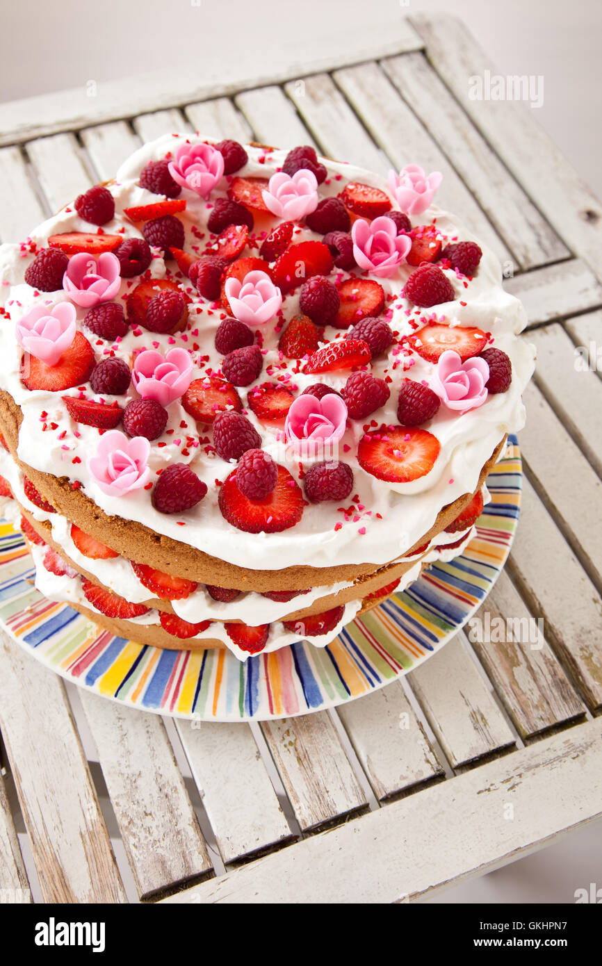 Birthday cake cake strawberry slices hi-res stock photography and ...