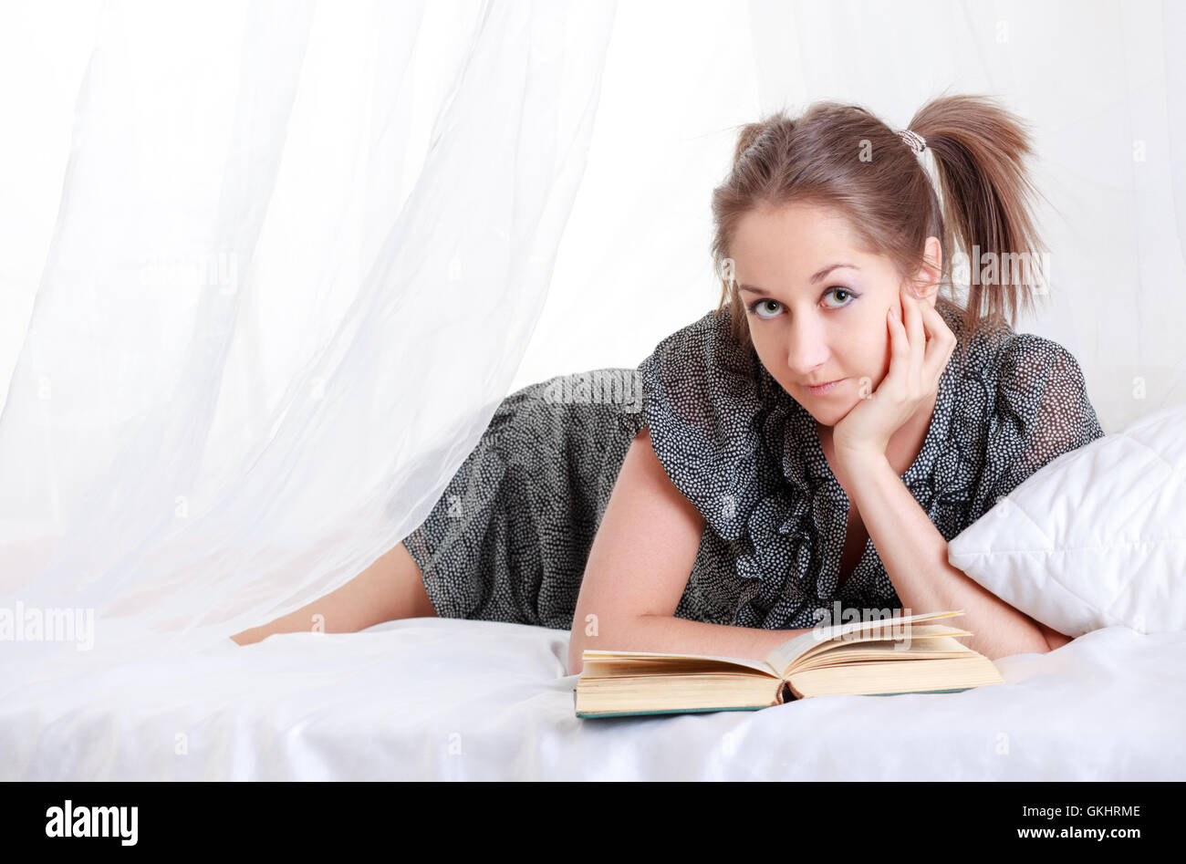 Girl Reading A Book Stock Photo - Alamy