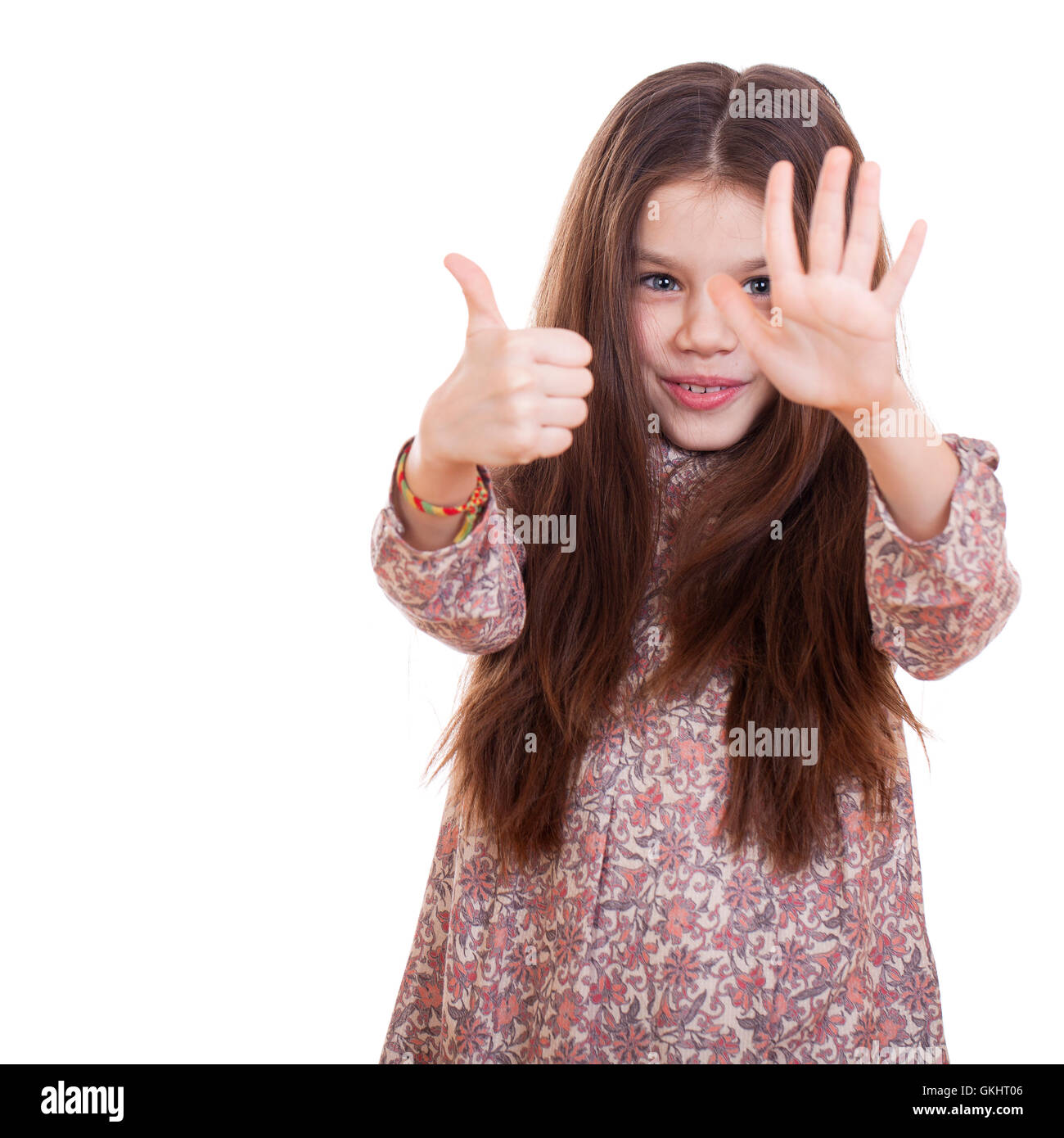 Beautiful little girl shows her fingers and palm, isolated on white ...