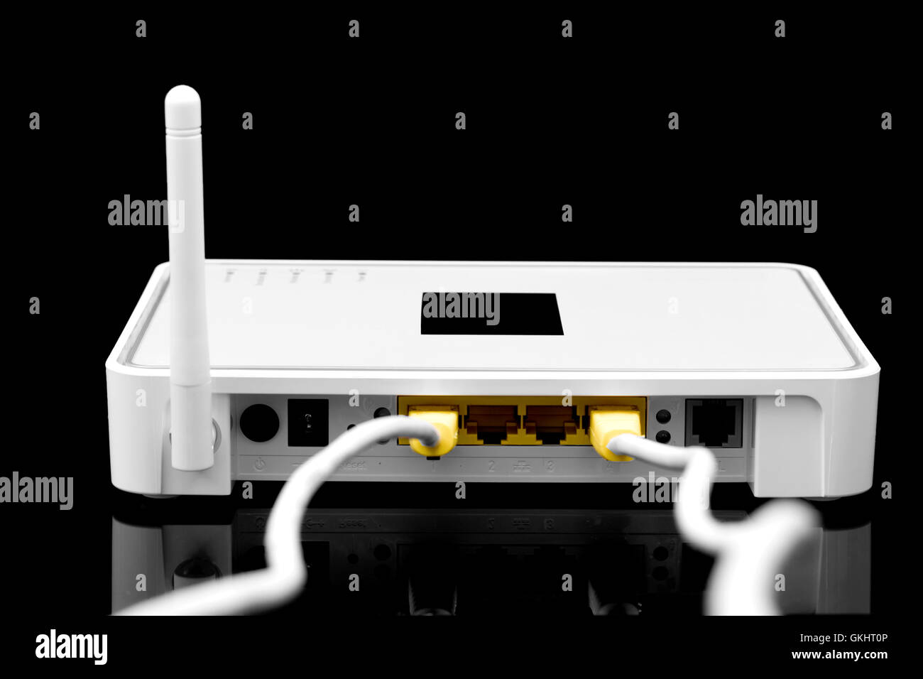 Wireless router with cables flying out, on a black background Stock ...