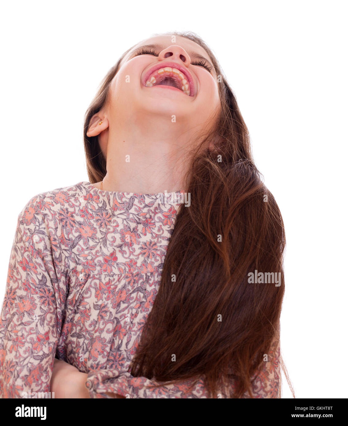Young beautiful girl laughs a lot of fun, on white isolated background ...