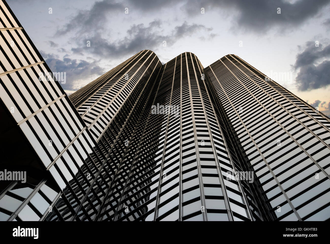 Skyscraper with clouds Stock Photo - Alamy