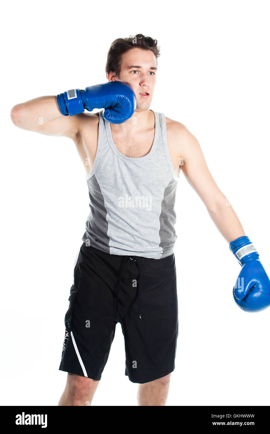 Young man boxing fighting pose Cut Out Stock Images & Pictures - Alamy