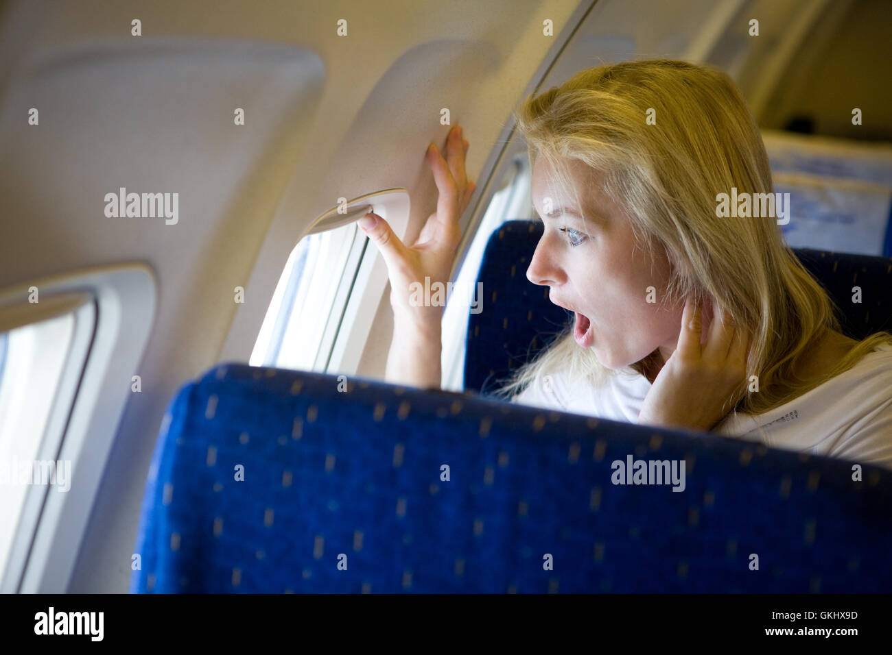 girl in the airplane Stock Photo - Alamy
