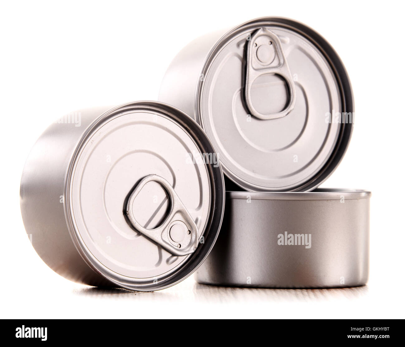 Composition with three metal cans isolated on white Stock Photo - Alamy