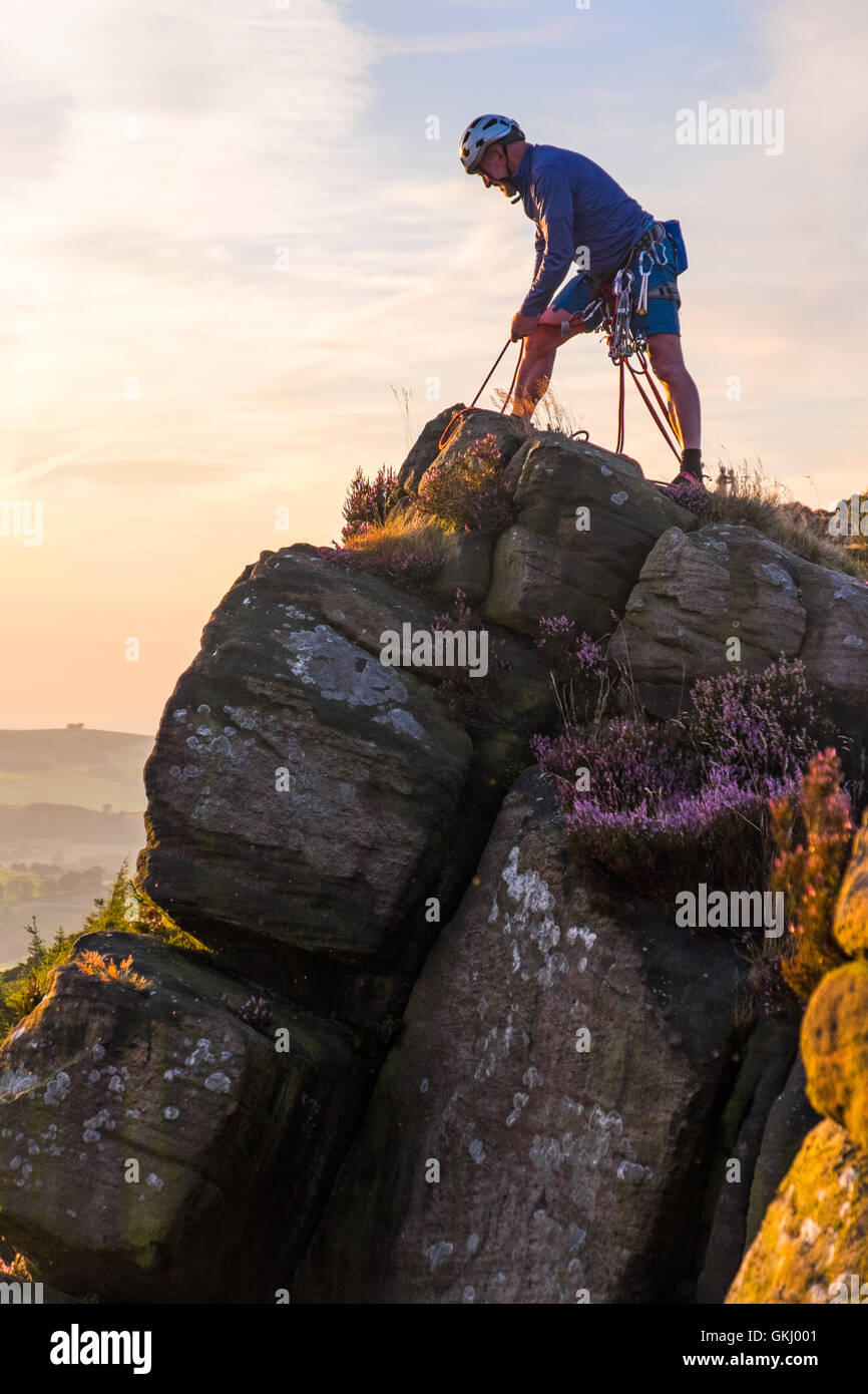 Two Retired Men Rock Climbing At The Roaches A Gritstone Crag In The