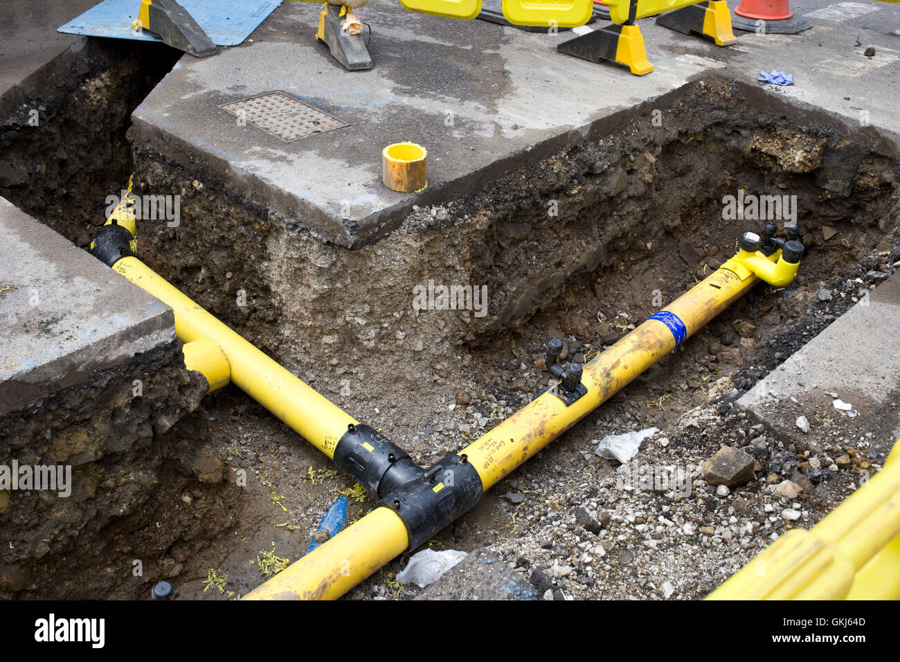 Gas pipes being replaced in road Stock Photo - Alamy