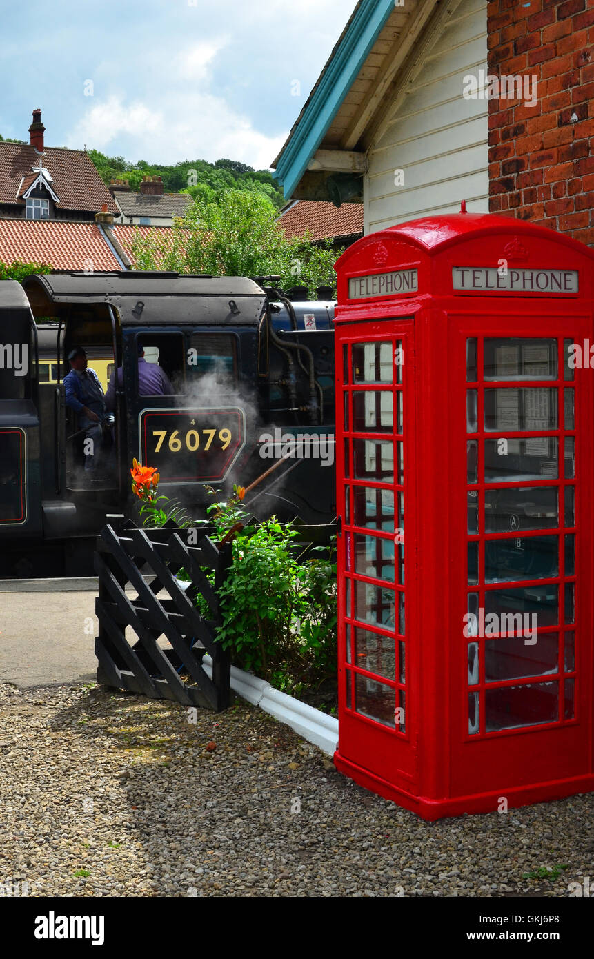 Red telephone box and steam train at Grosmont Station North Yorkshire ...
