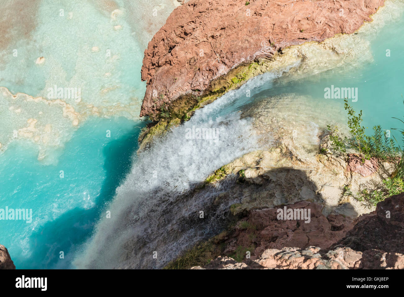 Havasu Creek plunges 100 feet over a travertine cliff into a pure ...