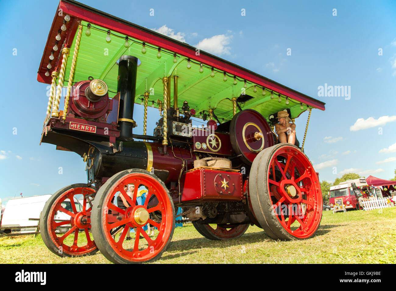 Lady sitting on a vintage traction engine at Shabbington steam rally ...