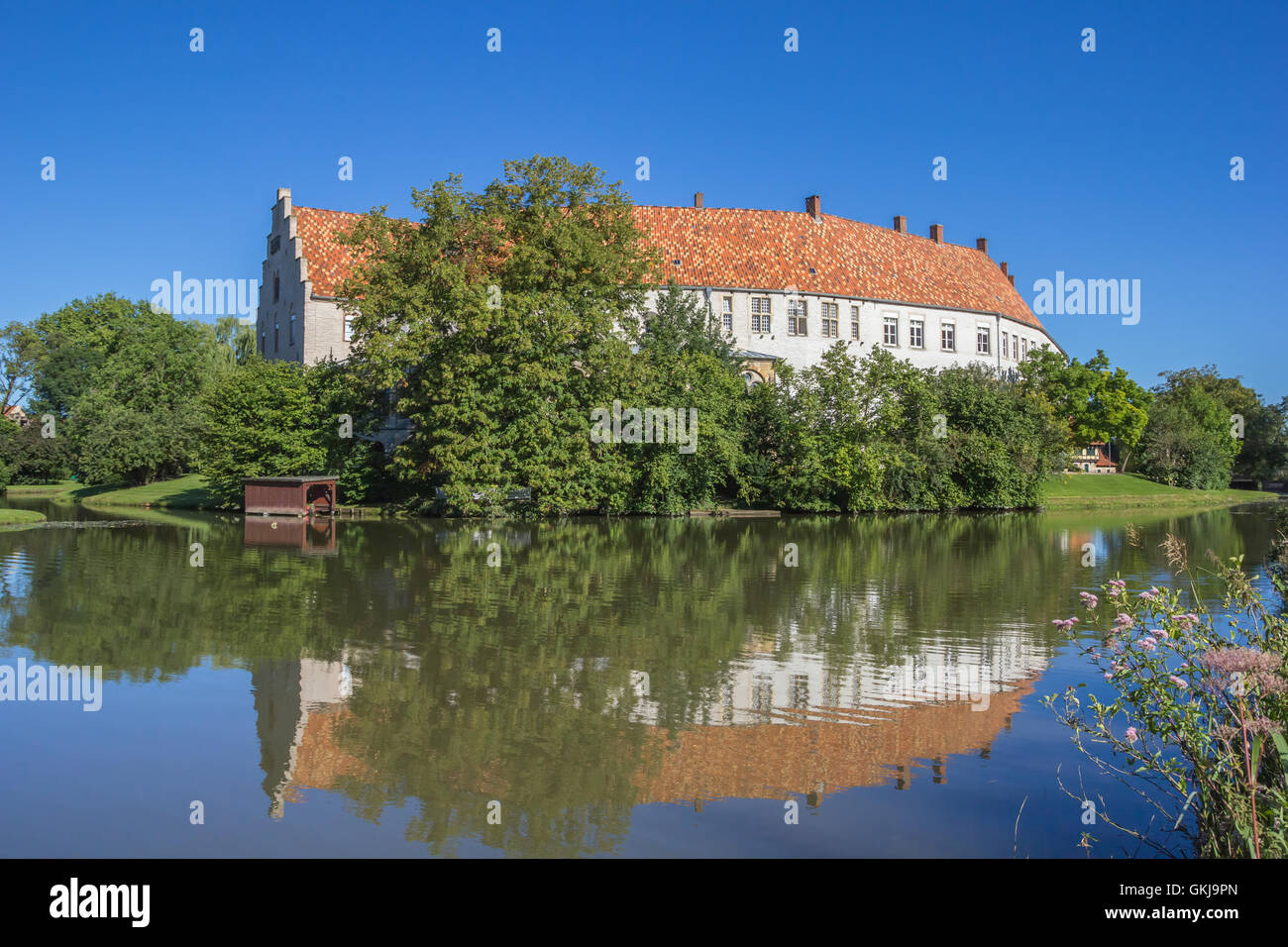 Historical German Steinfurt castle with reflection in the water Stock ...