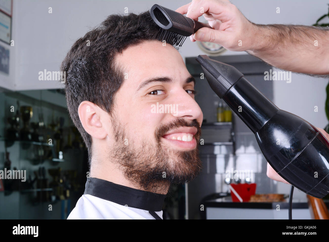 Man drying hair hi-res stock photography and images - Alamy