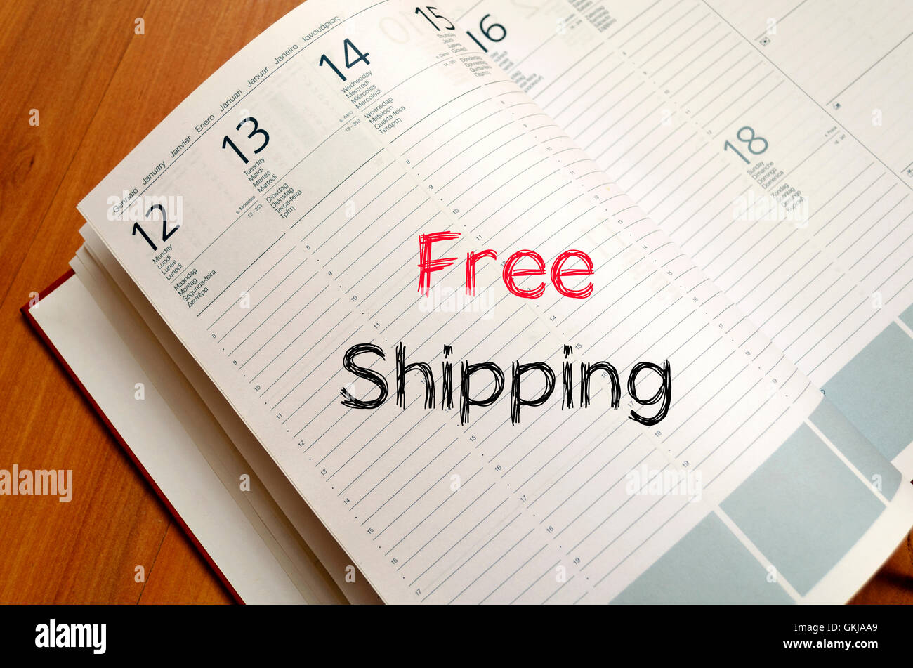 Free shipping text concept write on notebook Stock Photo - Alamy