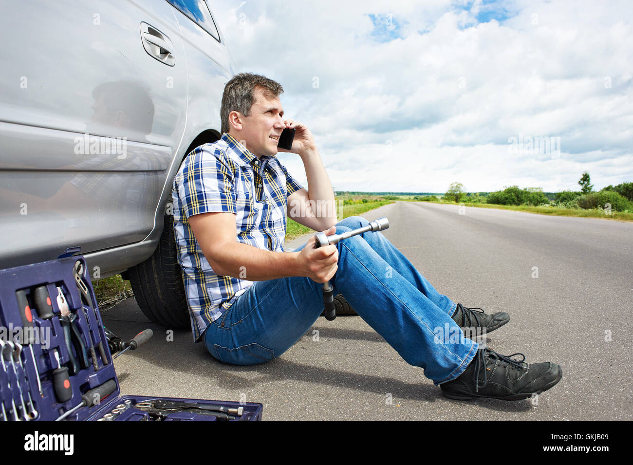 Man Tire Lift High Resolution Stock Photography and Images - Alamy