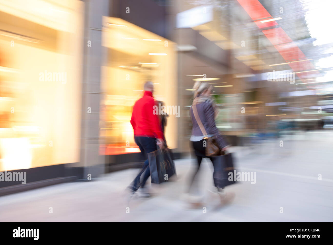 Blurred mall, people walking, zoom effect Stock Photo - Alamy
