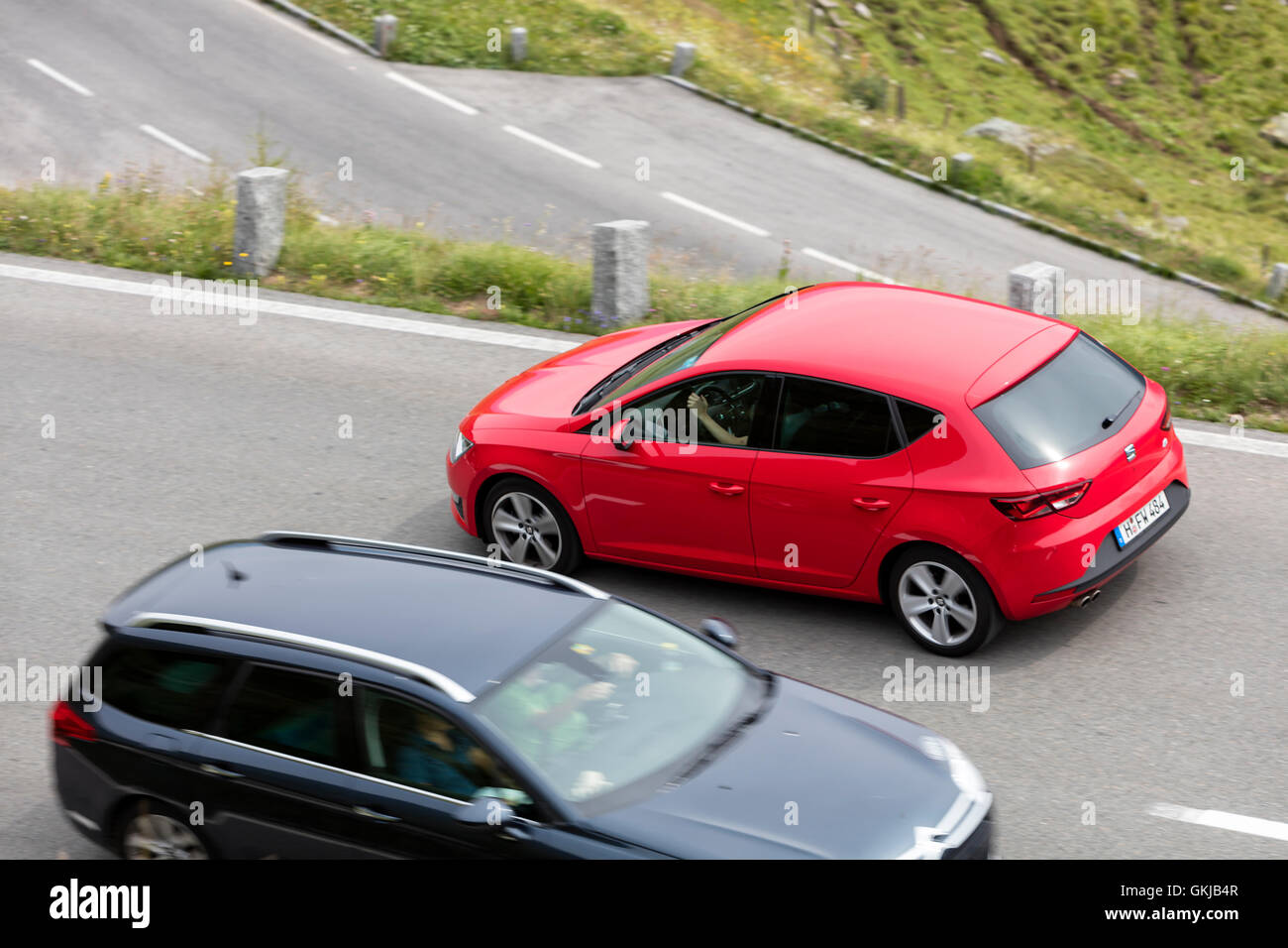 Cars speeding on the road Stock Photo - Alamy
