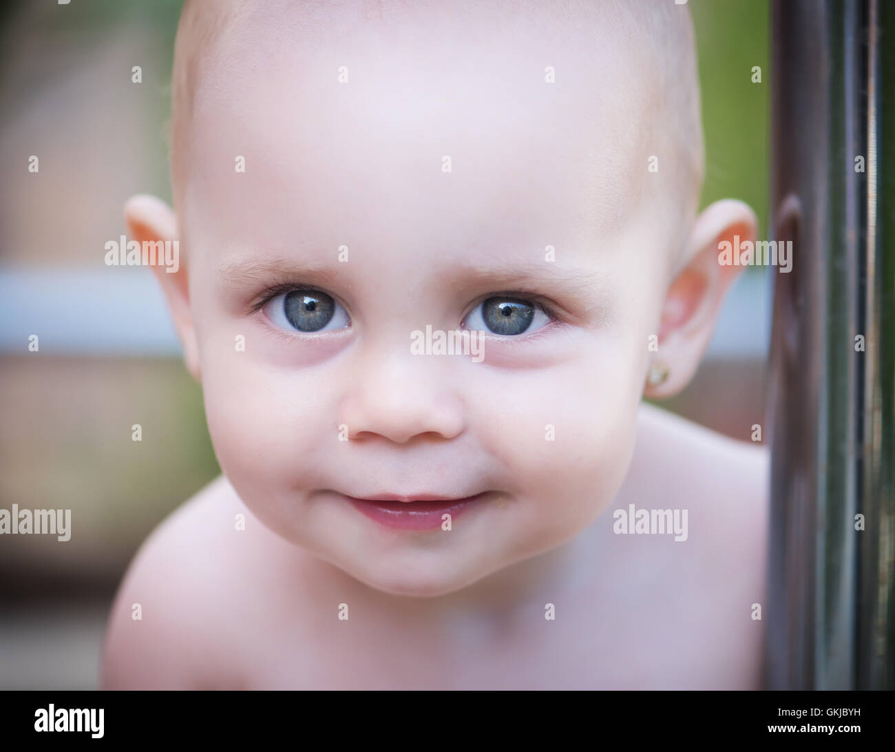 Cute joyful baby girl on the nature background Stock Photo - Alamy