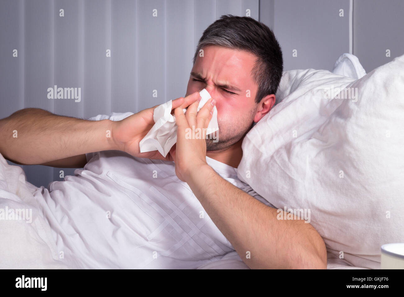 Sick people lie hi-res stock photography and images - Alamy