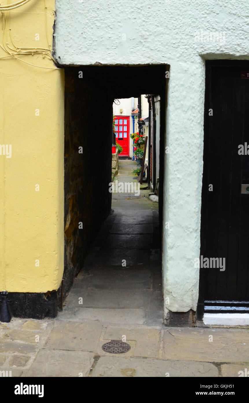 Alley way in the traditional fishing village of Staithes North ...