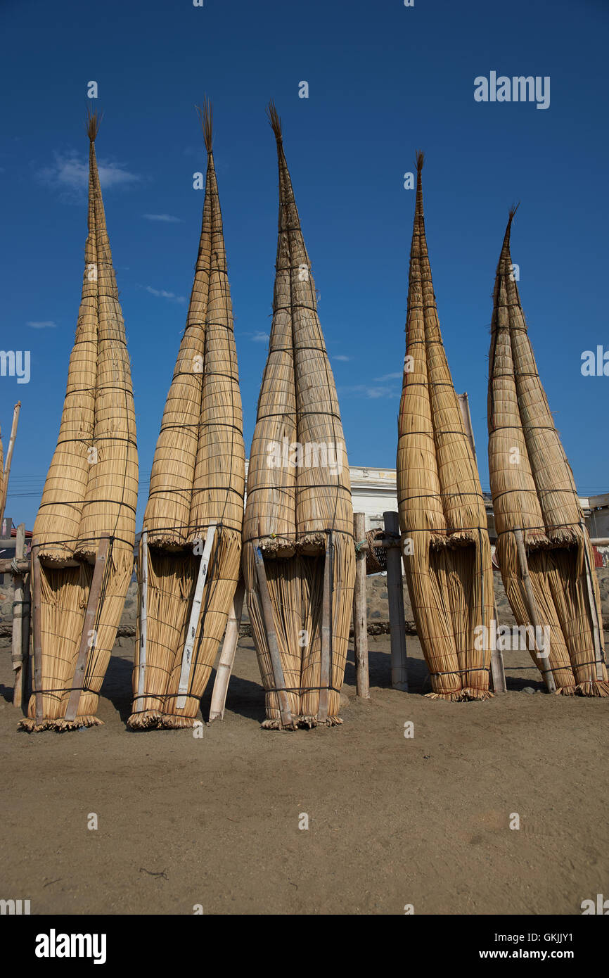 Traditional Peruvian fishing boats Stock Photo - Alamy