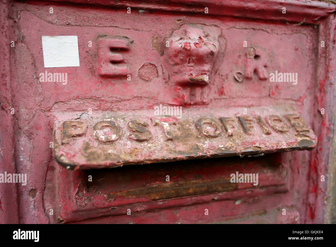 Old English Red Letterbox in wall Stock Photo - Alamy
