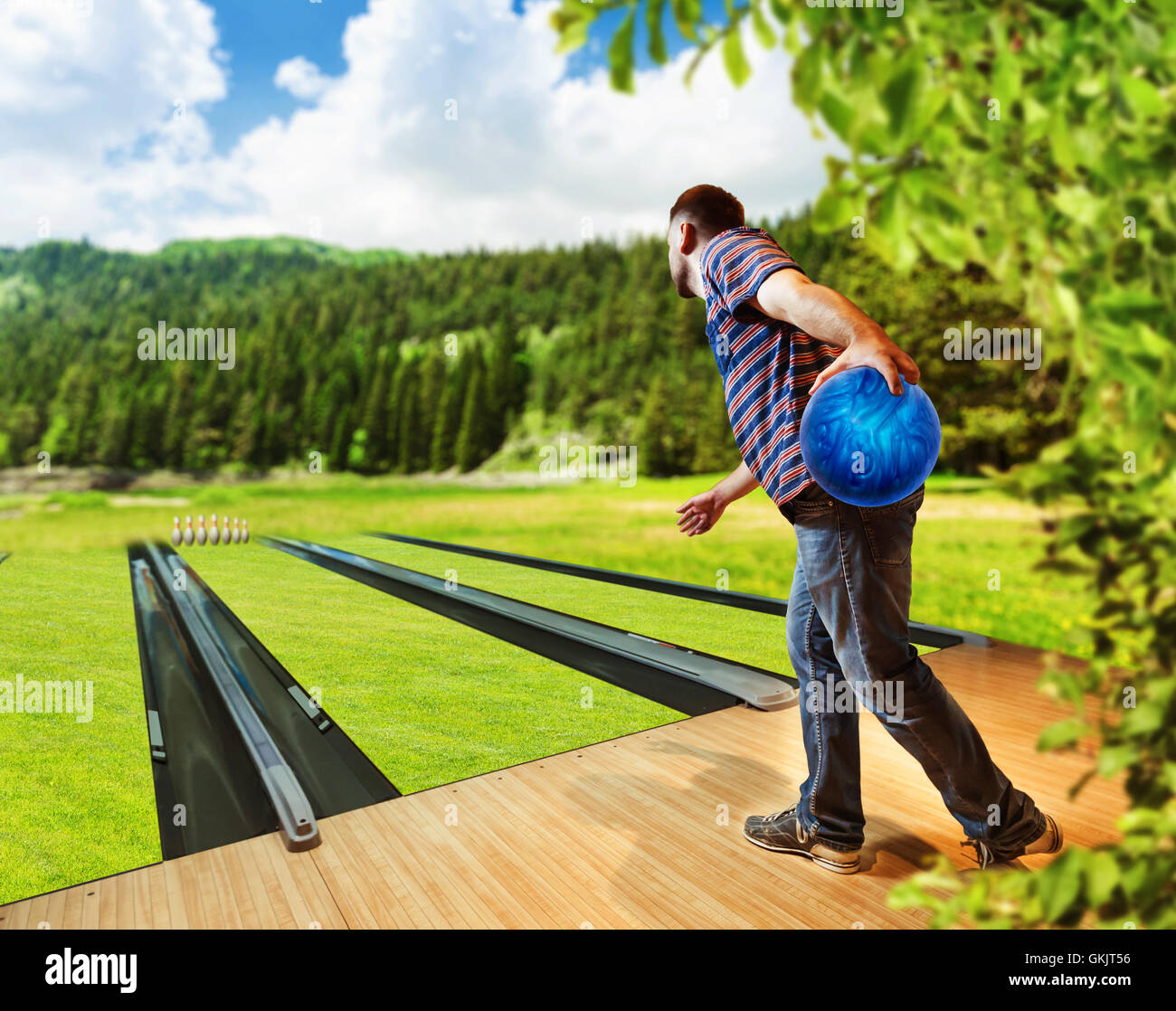 Man playing bowling Stock Photo - Alamy