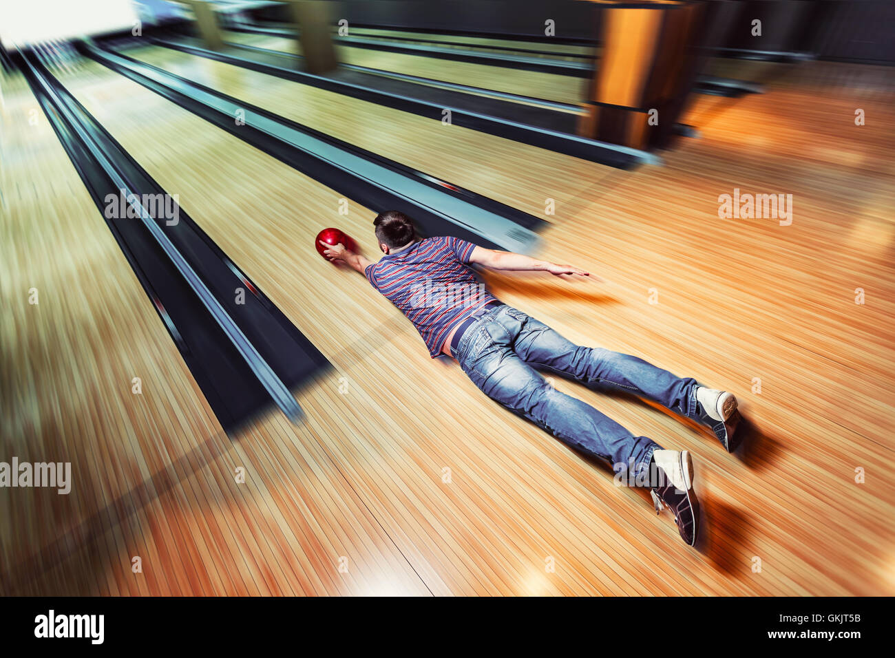 Man lying on the floor Stock Photo - Alamy