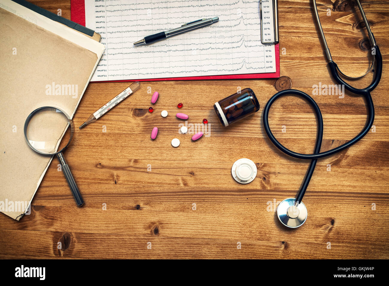 Doctor's work desk as copy space. General medical practitioner ...
