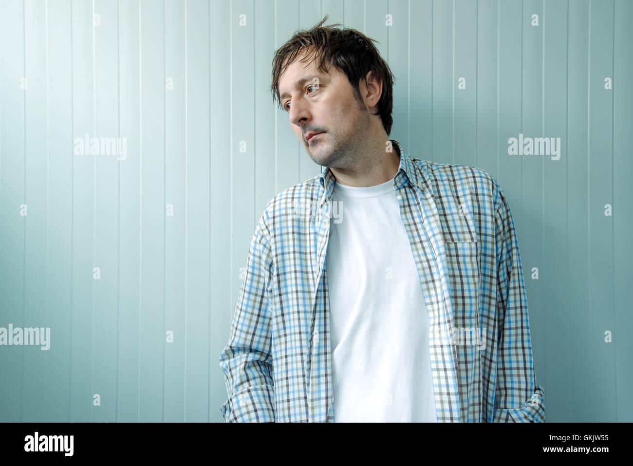 Sad and blue man, male person with unhappy gloomy facial expression ...