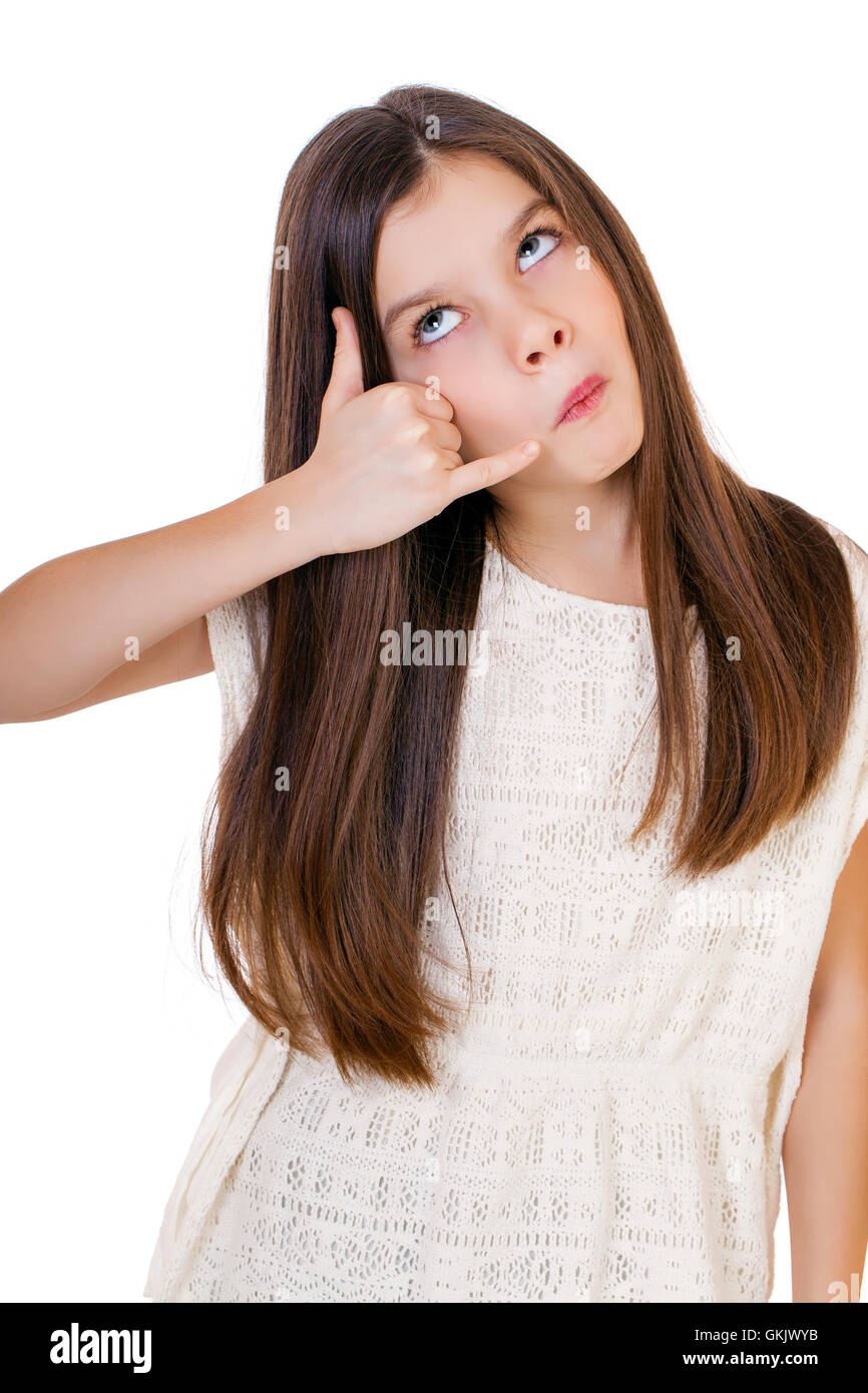 Little Girl making a call me gesture, against white background Stock ...