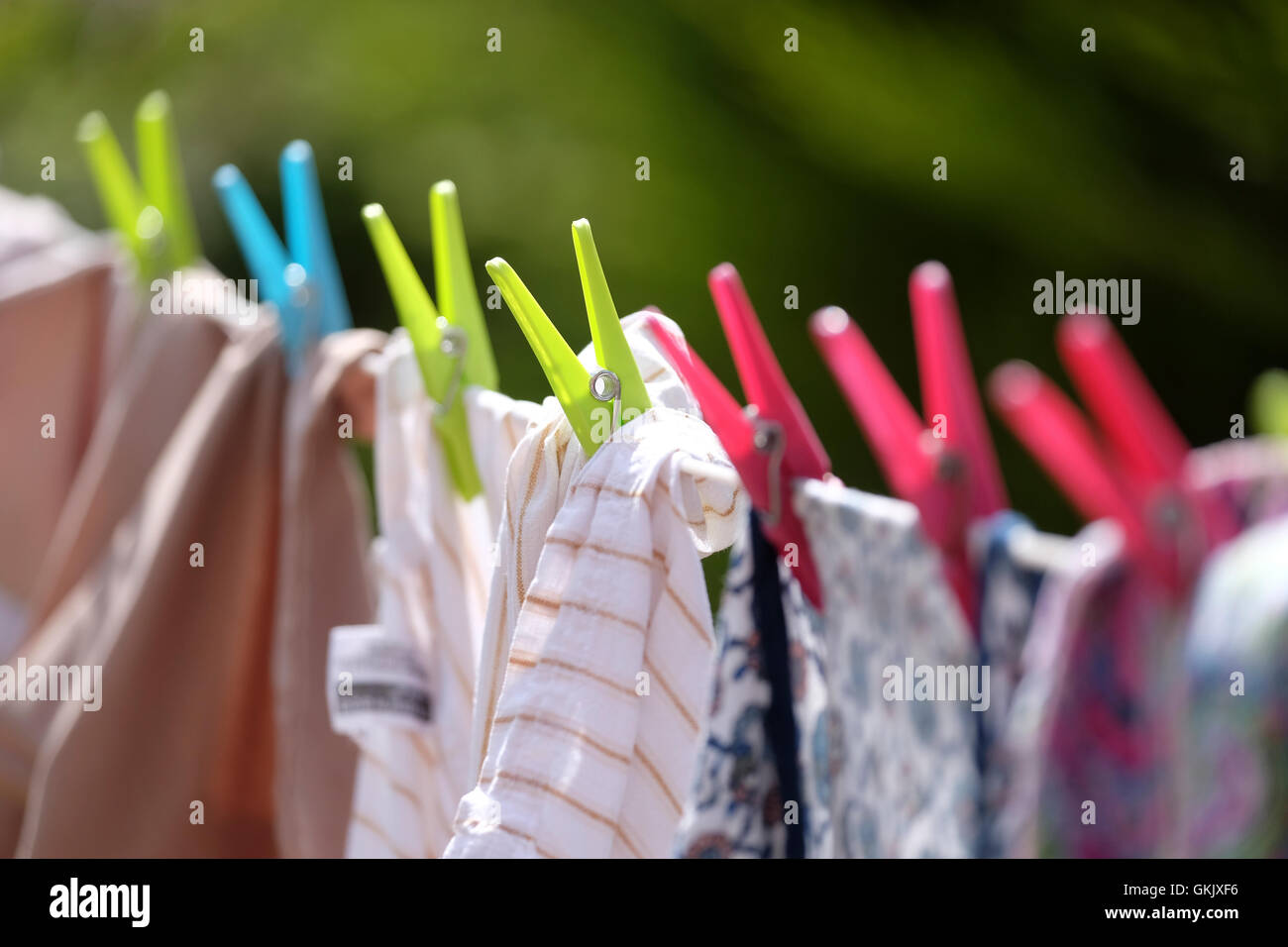 pegs and clothes on washing line Stock Photo - Alamy