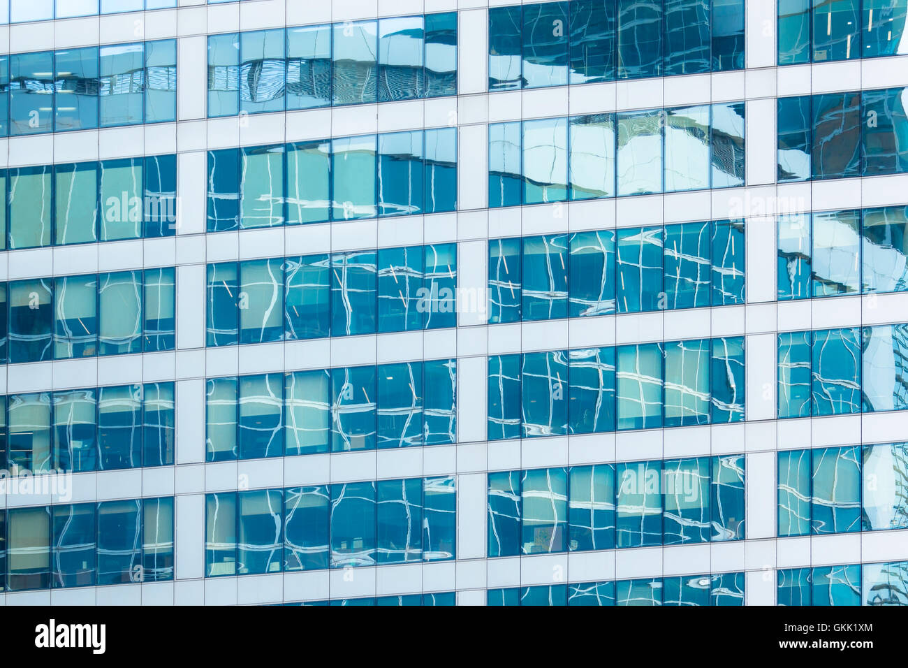 Close-up of the glass office building with reflections Stock Photo - Alamy