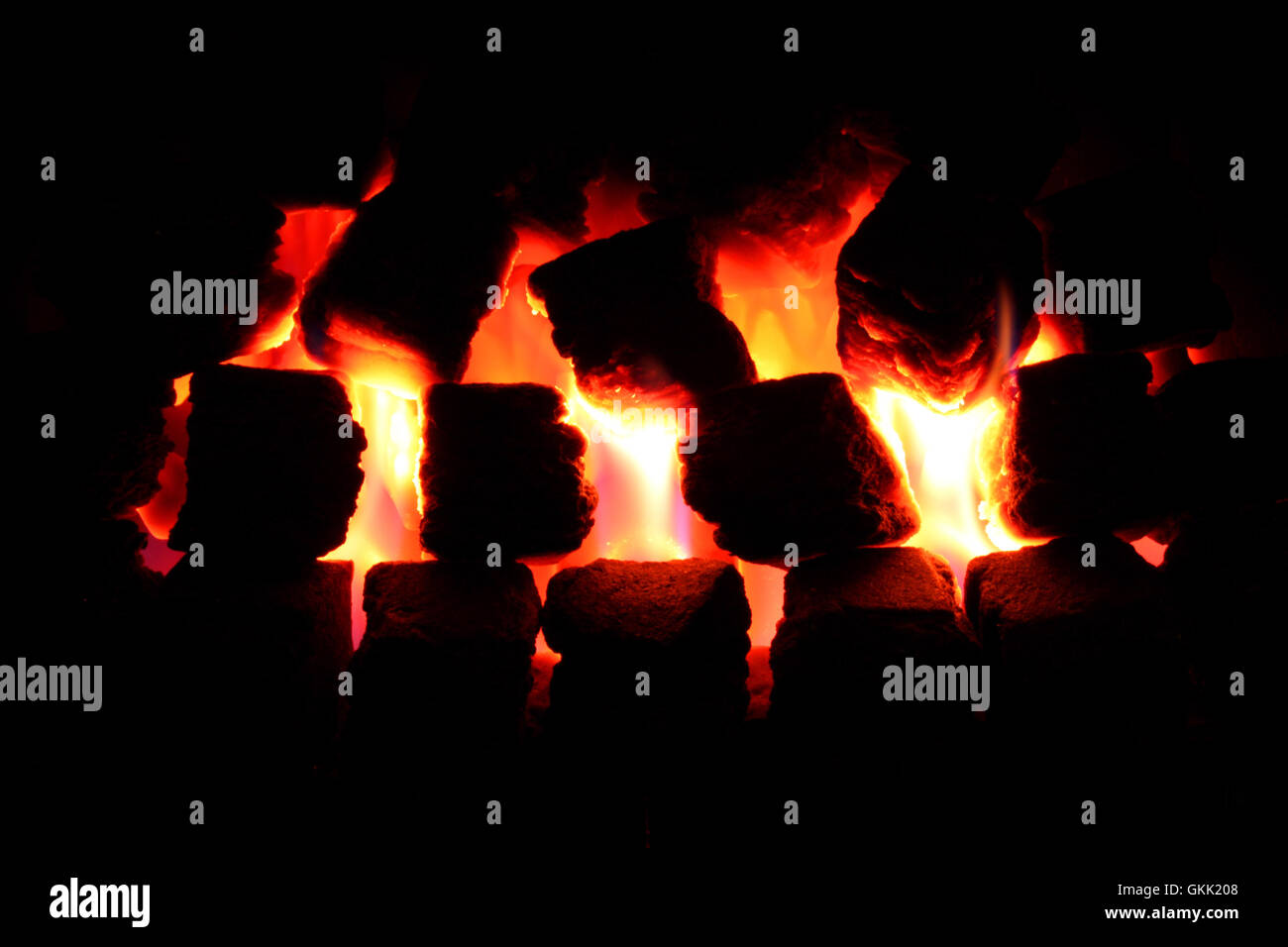 Lit coal fire close up Stock Photo - Alamy