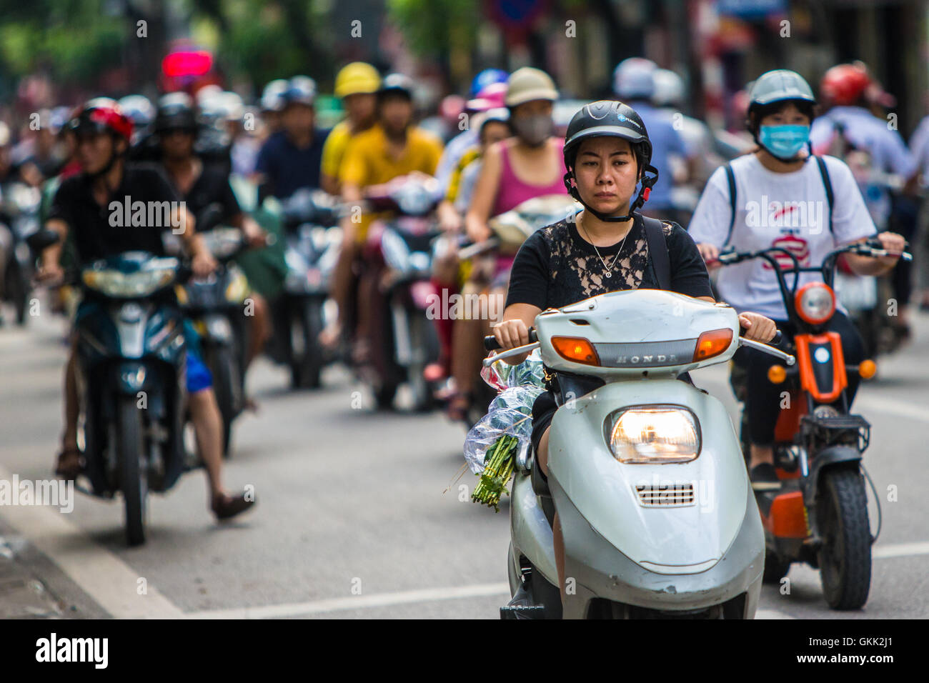 Vietnamese Moped Motorcycle Motorbike Riders on the streets of Hanoi in ...