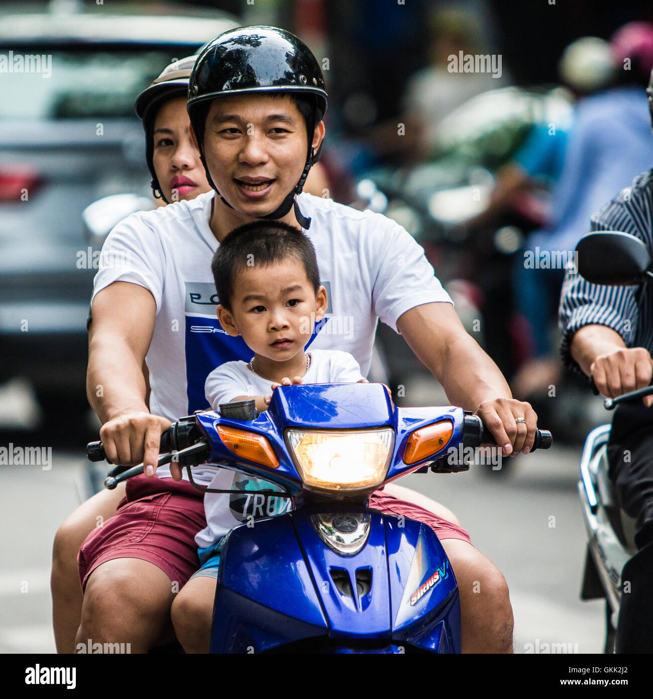 Vietnamese Moped Motorcycle Motorbike Riders on the streets of Hanoi in ...
