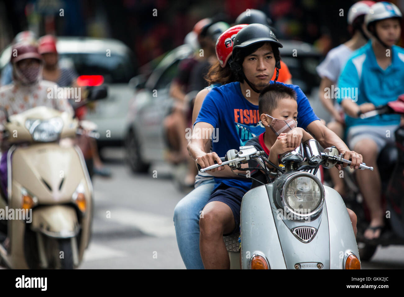 Vietnamese Moped Motorcycle Motorbike Riders on the streets of Hanoi in ...