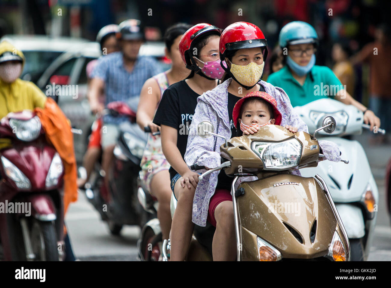 Vietnamese Moped Motorcycle Motorbike Riders on the streets of Hanoi in ...