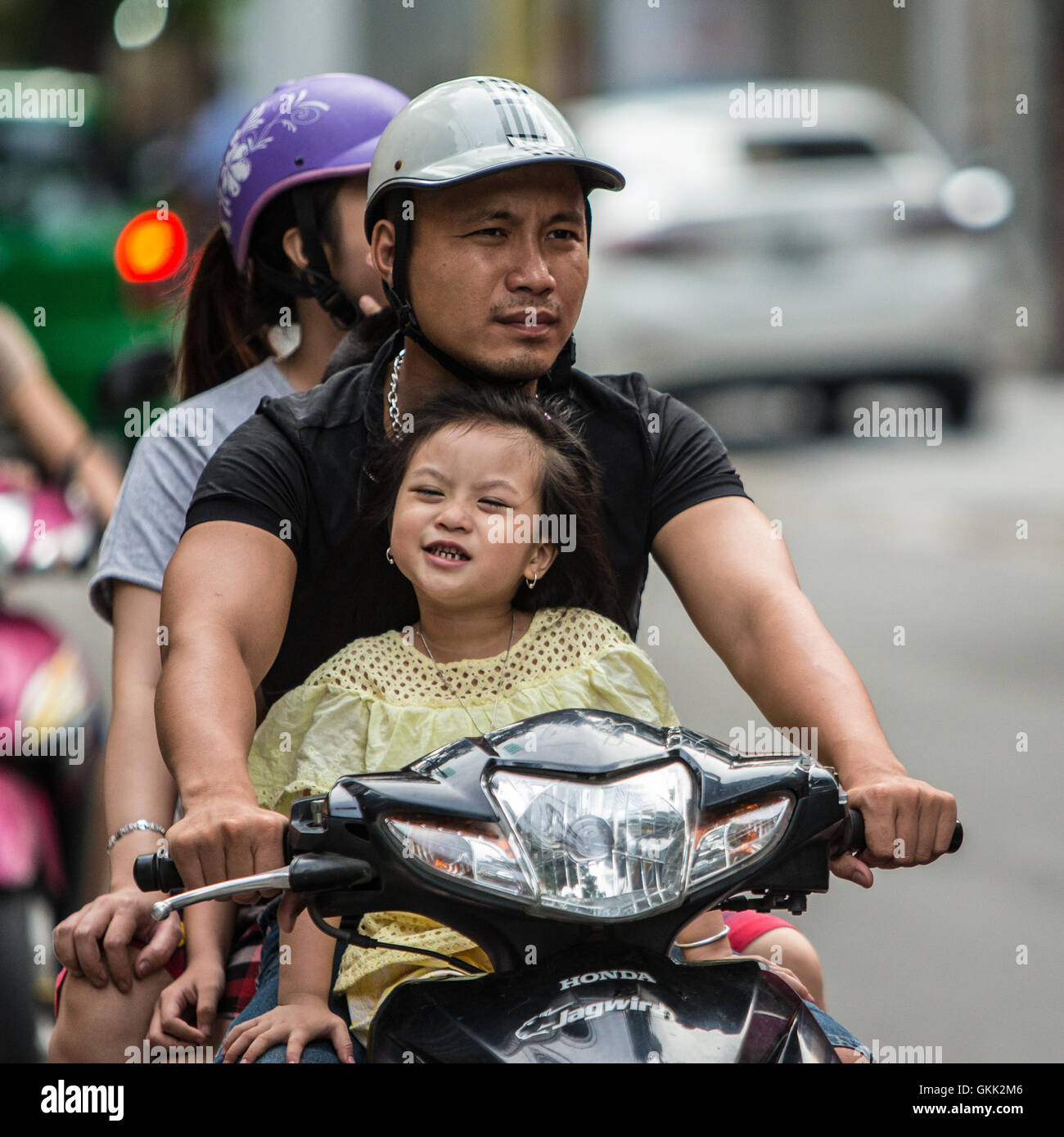 Vietnamese Moped Motorcycle Motorbike Riders on the streets of Hanoi in ...
