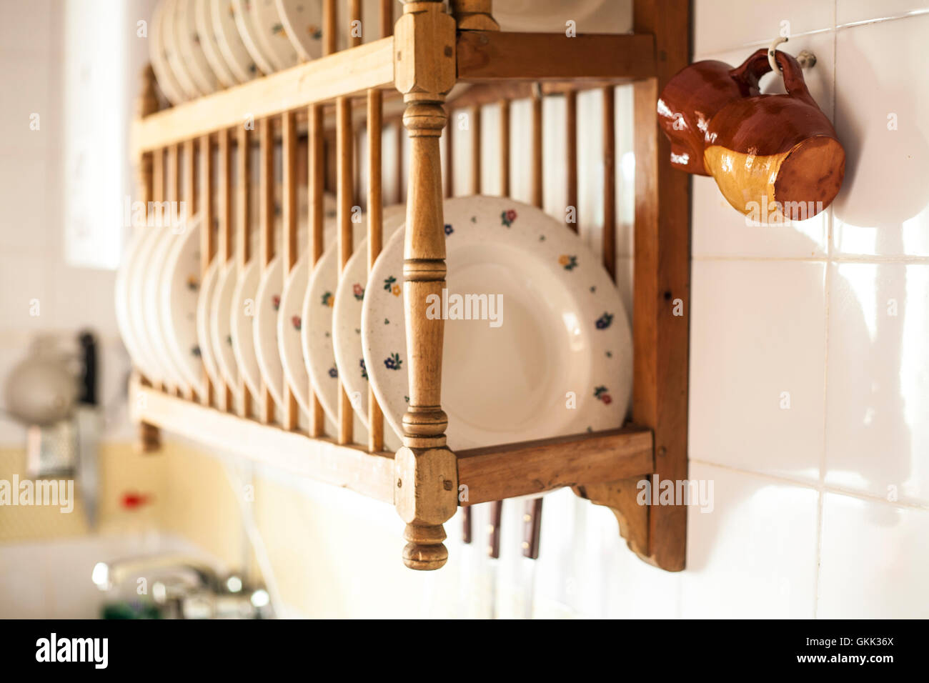 Old wooden plate rack in a cottage kitchen, Spain Stock Photo - Alamy