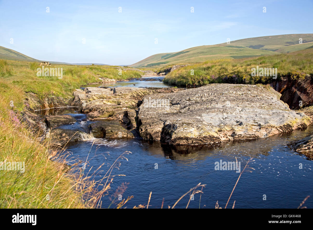 Afon Elan river flowing through sedimentary rocks in Cambrian mountains ...
