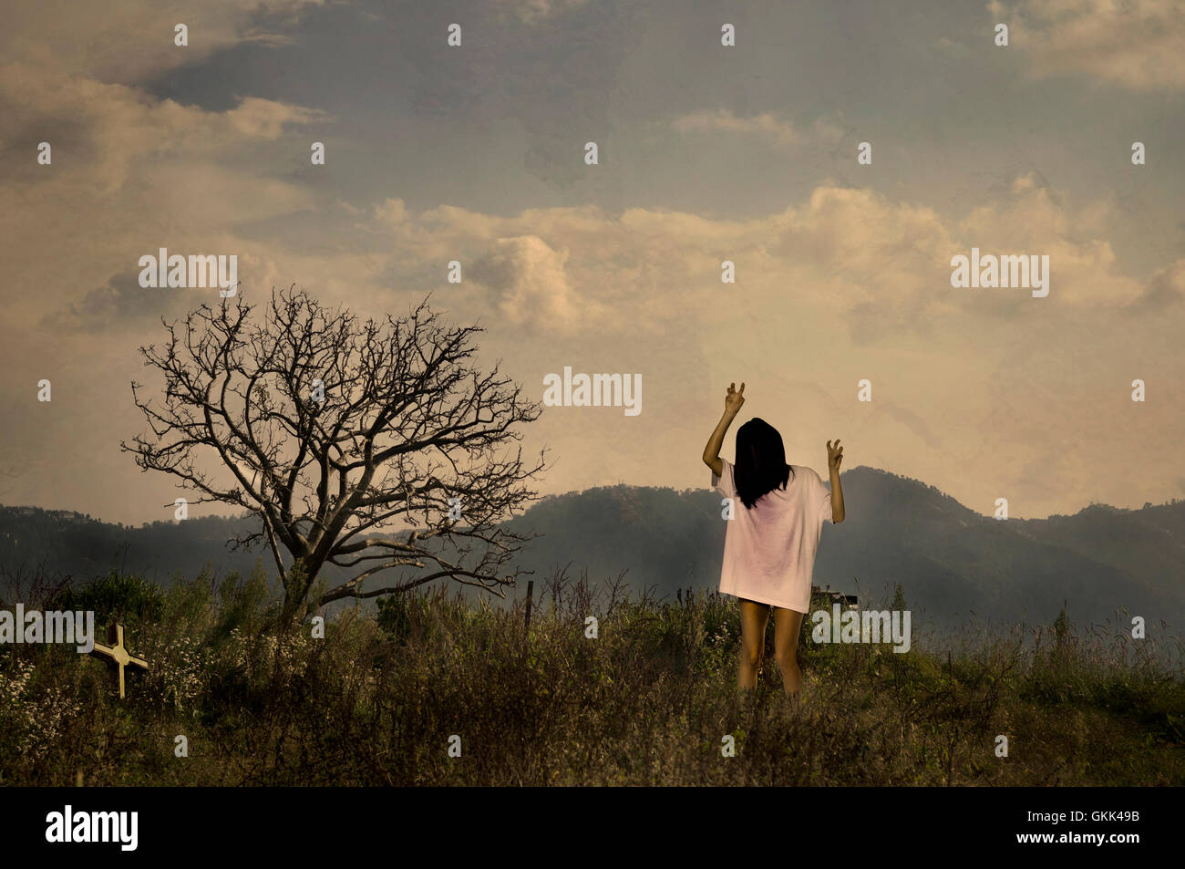 female ghost in the cemetry, grunge style Stock Photo - Alamy