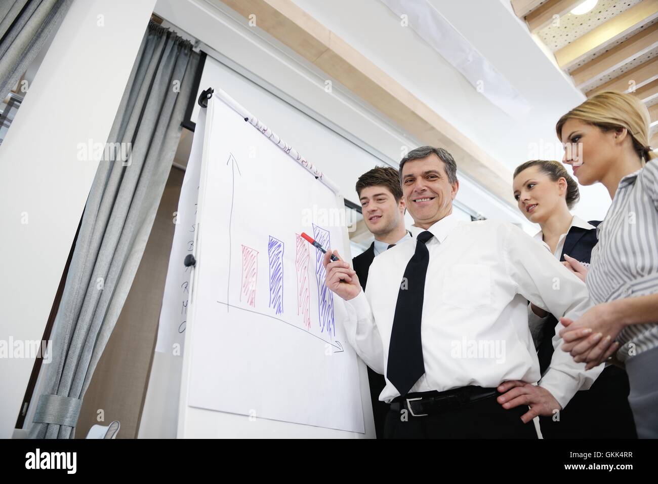 Senior business man giving a presentation Stock Photo - Alamy