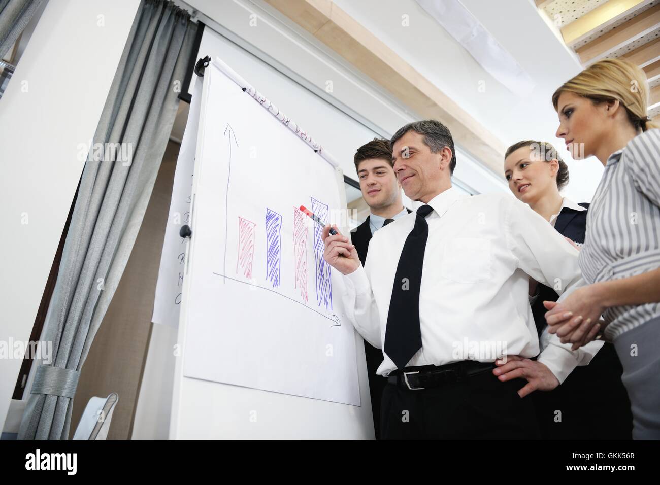 Senior business man giving a presentation Stock Photo - Alamy