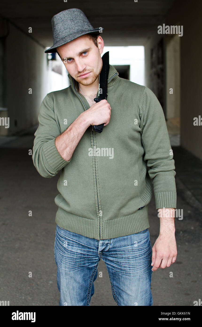 Portrait of a street bandit with knife in hand Stock Photo - Alamy